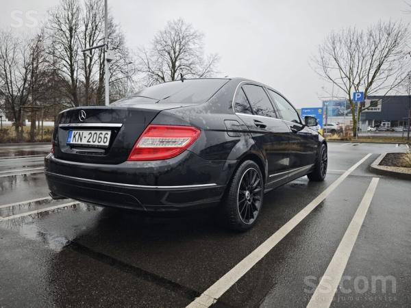Black Mercedes-Benz C 200 2010 in Riga, with an engine capacity of 1.80 L and mileage of 184 thousand km for 6100 €, photo 7 on AUTOMOTO.COM.LV