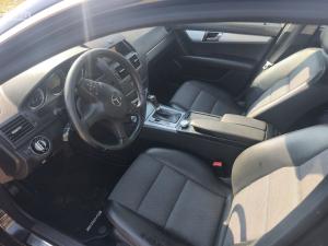 Black Mercedes-Benz C 200 2010 in Utena, with an engine capacity of 2.10 L and mileage of 274 thousand km for 4600 €, photo 19 on AUTOMOTO.COM.LV