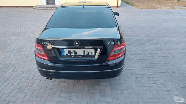 Black Mercedes-Benz C 200 2011 in Trakai, with an engine capacity of 2.00 L and mileage of 320 thousand km for 3500 €, photo 2 on AUTOMOTO.COM.LV