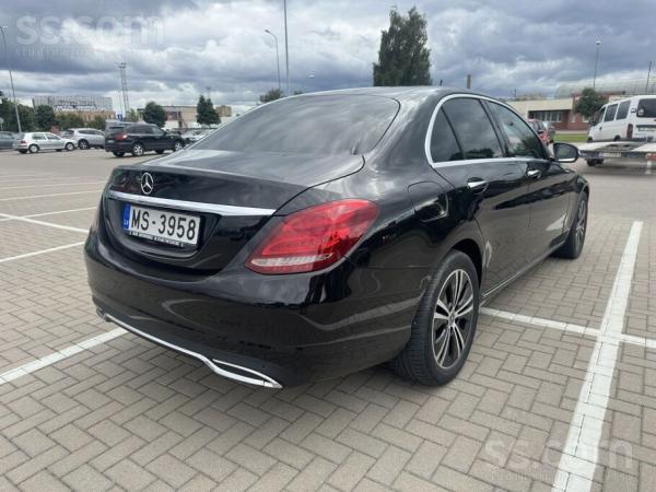 Black Mercedes-Benz C 200 2015 in Riga, with an engine capacity of 1.60 L and mileage of 239 thousand km for 13200 €, photo 5 on AUTOMOTO.COM.LV
