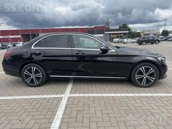 Black Mercedes-Benz C 200 2015 in Riga, with an engine capacity of 1.60 L and mileage of 239 thousand km for 13200 €, photo 7 on AUTOMOTO.COM.LV
