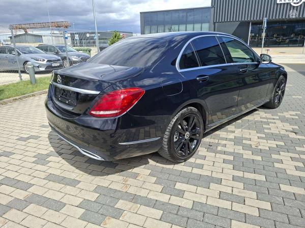 Black Mercedes-Benz C 200 2016 in Siauliai, with an engine capacity of 1.60 L and mileage of 234 thousand km for 9900 €, photo 3 on AUTOMOTO.COM.LV