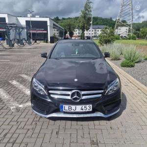 Black Mercedes-Benz C 200 2017 in Kaunas, with an engine capacity of 1.99 L and mileage of 105 thousand km for 18400 €, photo  on AUTOMOTO.COM.LV