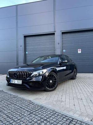 Black Mercedes-Benz C 200 2017 in Kaunas, with an engine capacity of 1.99 L and mileage of 210 thousand km for 17800 €, photo  on AUTOMOTO.COM.LV