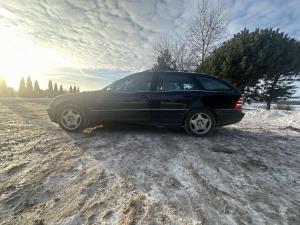 Black Mercedes-Benz C 200 2005 in Alytus, with an engine capacity of 1.80 L and mileage of 186 thousand km for 2400 €, photo  on AUTOMOTO.COM.LV