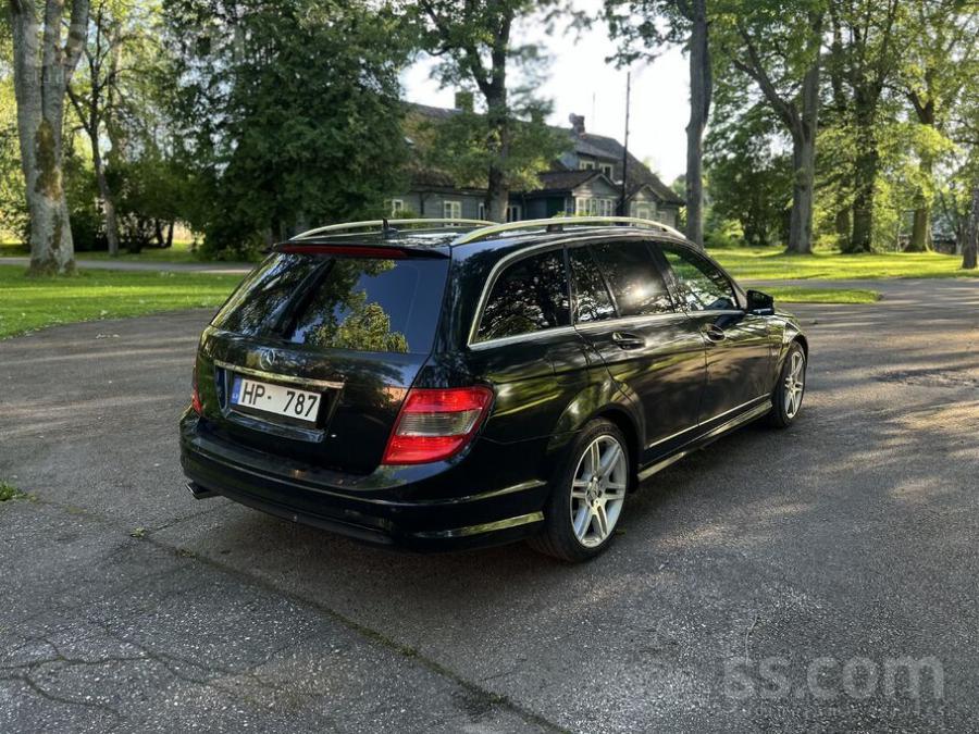 Black Mercedes-Benz C 200 2010 in Cesis, with an engine capacity of 2.20 L and mileage of 312 thousand km for 5490 €, photo 5 on AUTOMOTO.COM.LV