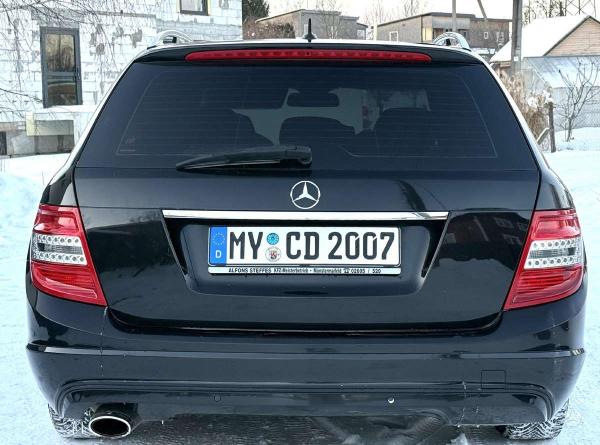 Black Mercedes-Benz C 200 2010 in Kaunas, with an engine capacity of 2.15 L and mileage of 310 thousand km for 4350 €, photo 5 on AUTOMOTO.COM.LV