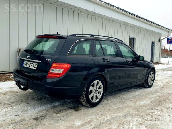 Black Mercedes-Benz C 200 2011 in Riga, with an engine capacity of 2.20 L and mileage of 373 thousand km for 5490 €, photo 4 on AUTOMOTO.COM.LV