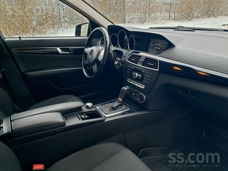Black Mercedes-Benz C 200 2011 in Riga, with an engine capacity of 2.20 L and mileage of 373 thousand km for 5490 €, photo 12 on AUTOMOTO.COM.LV