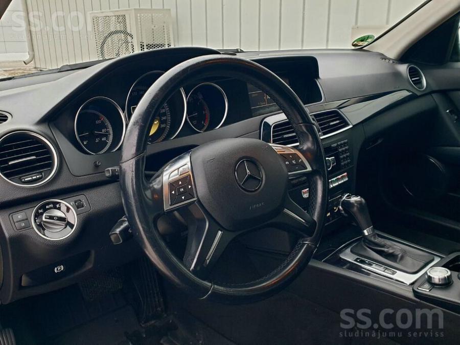 Black Mercedes-Benz C 200 2011 in Riga, with an engine capacity of 2.20 L and mileage of 373 thousand km for 5490 €, photo 13 on AUTOMOTO.COM.LV