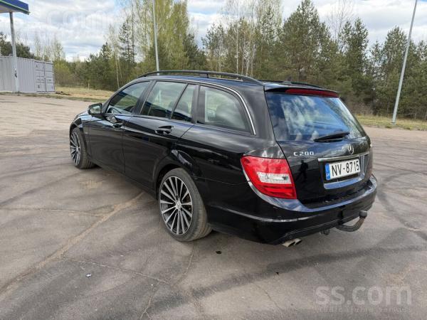 Black Mercedes-Benz C 200 2011 in Daugavpils, with an engine capacity of 2.00 L and mileage of 370 thousand km for 5750 €, photo 6 on AUTOMOTO.COM.LV