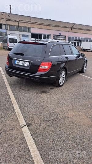 Black Mercedes-Benz C 200 2013 in Riga, with an engine capacity of 2.10 L and mileage of 264 thousand km for 6200 €, photo 4 on AUTOMOTO.COM.LV