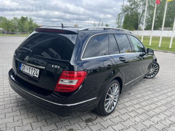 Black Mercedes-Benz C 200 2013 in Jekabpils, with an engine capacity of 2.00 L and mileage of 311 thousand km for 5900 €, photo 2 on AUTOMOTO.COM.LV