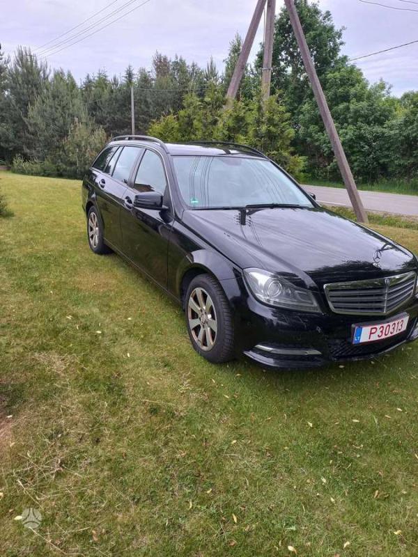 Black Mercedes-Benz C 200 2013 in Panevezys, with an engine capacity of 2.14 L and mileage of 360 thousand km for 5600 €, photo 1 on AUTOMOTO.COM.LV