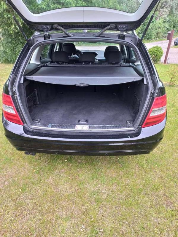 Black Mercedes-Benz C 200 2013 in Panevezys, with an engine capacity of 2.14 L and mileage of 360 thousand km for 5600 €, photo 8 on AUTOMOTO.COM.LV