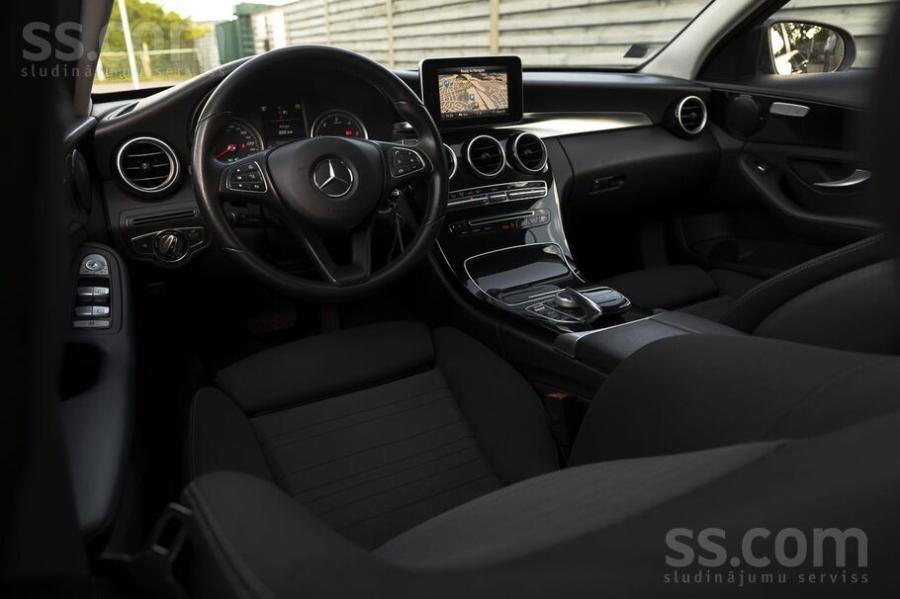 Black Mercedes-Benz C 200 2015 in Jelgava, with an engine capacity of 1.60 L and mileage of 270 thousand km for 11500 €, photo 16 on AUTOMOTO.COM.LV