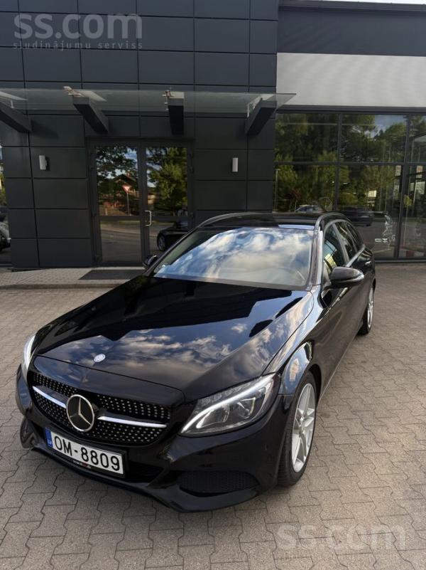 Black Mercedes-Benz C 200 2015 in Dobele, with an engine capacity of 1.60 L and mileage of 254 thousand km for 8990 €, photo 1 on AUTOMOTO.COM.LV