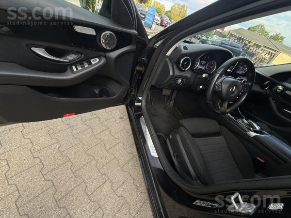Black Mercedes-Benz C 200 2015 in Dobele, with an engine capacity of 1.60 L and mileage of 254 thousand km for 8990 €, photo 7 on AUTOMOTO.COM.LV