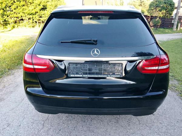 Black Mercedes-Benz C 200 2015 in Kaunas, with an engine capacity of 1.60 L and mileage of 320 thousand km for 7399 €, photo 8 on AUTOMOTO.COM.LV