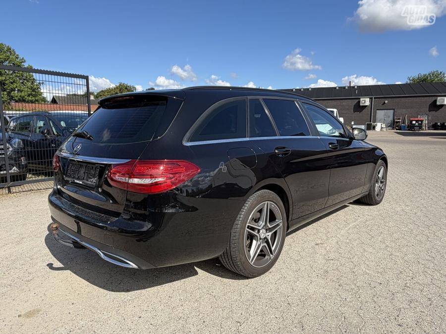 Black Mercedes-Benz C 200 2015 in Vilnius, with an engine capacity of 1.60 L and mileage of 235 thousand km for 8999 €, photo 4 on AUTOMOTO.COM.LV