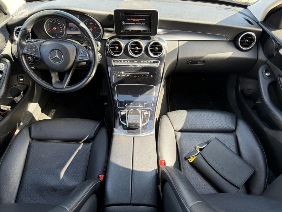 Black Mercedes-Benz C 200 2015 in Vilnius, with an engine capacity of 1.60 L and mileage of 235 thousand km for 8999 €, photo 6 on AUTOMOTO.COM.LV