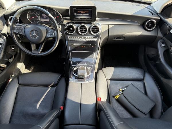 Black Mercedes-Benz C 200 2015 in Vilnius, with an engine capacity of 1.60 L and mileage of 235 thousand km for 8999 €, photo 5 on AUTOMOTO.COM.LV