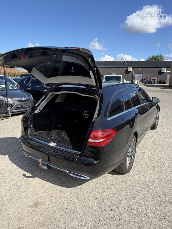 Black Mercedes-Benz C 200 2015 in Vilnius, with an engine capacity of 1.60 L and mileage of 235 thousand km for 8999 €, photo 10 on AUTOMOTO.COM.LV