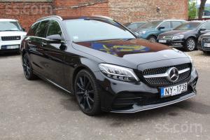 Black Mercedes-Benz C 200 2019 in Liepaja, with an engine capacity of 1.60 L and mileage of 178 thousand km for 15750 €, photo 1 on AUTOMOTO.COM.LV