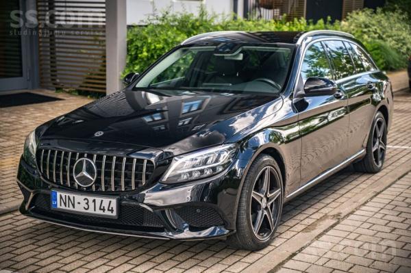 Black Mercedes-Benz C 200 2019 in Riga, with an engine capacity of 1.60 L and mileage of 185 thousand km for 14990 €, photo 1 on AUTOMOTO.COM.LV