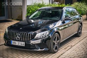 Black Mercedes-Benz C 200 2019 in Riga, with an engine capacity of 1.60 L and mileage of 185 thousand km for 14990 €, photo  on AUTOMOTO.COM.LV