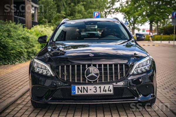 Black Mercedes-Benz C 200 2019 in Riga, with an engine capacity of 1.60 L and mileage of 185 thousand km for 14990 €, photo 2 on AUTOMOTO.COM.LV