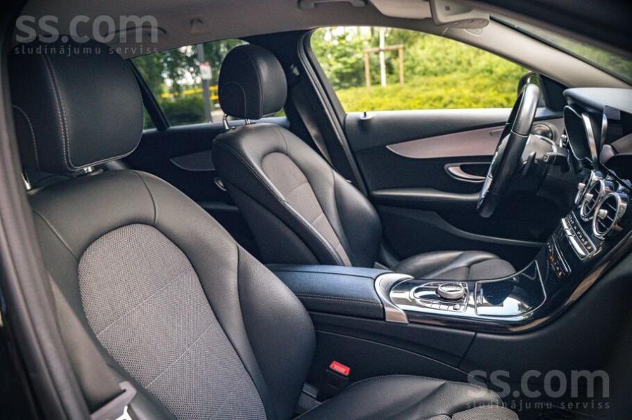 Black Mercedes-Benz C 200 2019 in Riga, with an engine capacity of 1.60 L and mileage of 185 thousand km for 14990 €, photo 8 on AUTOMOTO.COM.LV