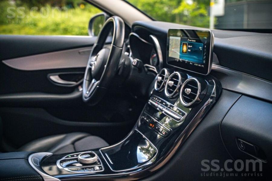 Black Mercedes-Benz C 200 2019 in Riga, with an engine capacity of 1.60 L and mileage of 185 thousand km for 14990 €, photo 9 on AUTOMOTO.COM.LV