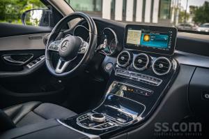Black Mercedes-Benz C 200 2019 in Riga, with an engine capacity of 1.60 L and mileage of 185 thousand km for 14990 €, photo 11 on AUTOMOTO.COM.LV