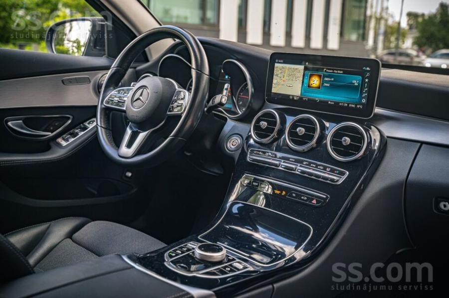 Black Mercedes-Benz C 200 2019 in Riga, with an engine capacity of 1.60 L and mileage of 185 thousand km for 14990 €, photo 11 on AUTOMOTO.COM.LV