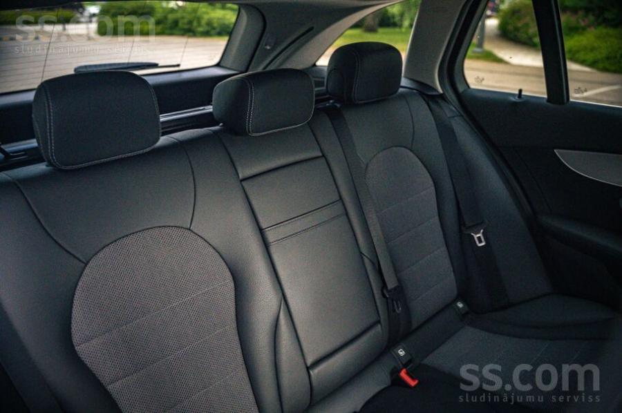Black Mercedes-Benz C 200 2019 in Riga, with an engine capacity of 1.60 L and mileage of 185 thousand km for 14990 €, photo 12 on AUTOMOTO.COM.LV