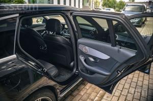 Black Mercedes-Benz C 200 2019 in Riga, with an engine capacity of 1.60 L and mileage of 185 thousand km for 14990 €, photo 13 on AUTOMOTO.COM.LV