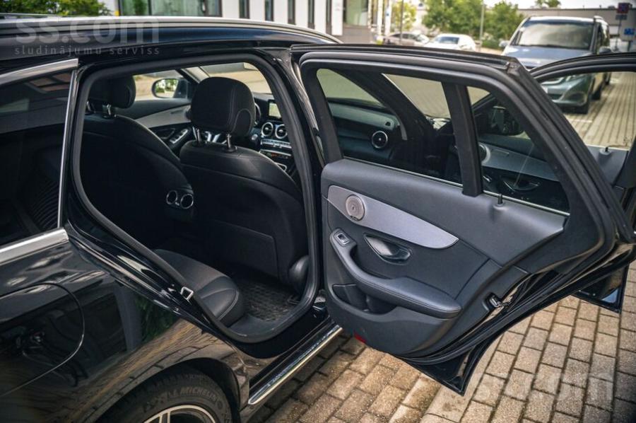 Black Mercedes-Benz C 200 2019 in Riga, with an engine capacity of 1.60 L and mileage of 185 thousand km for 14990 €, photo 13 on AUTOMOTO.COM.LV