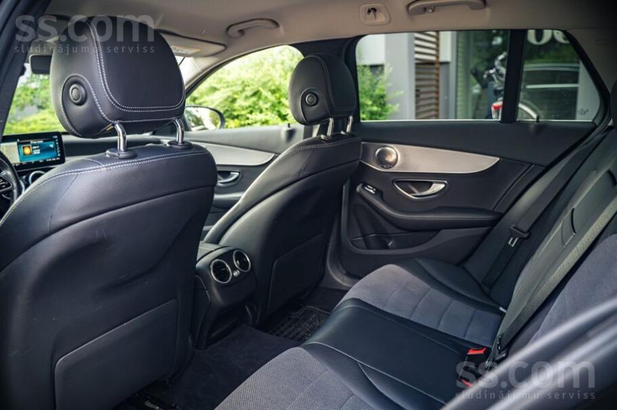 Black Mercedes-Benz C 200 2019 in Riga, with an engine capacity of 1.60 L and mileage of 185 thousand km for 14990 €, photo 16 on AUTOMOTO.COM.LV