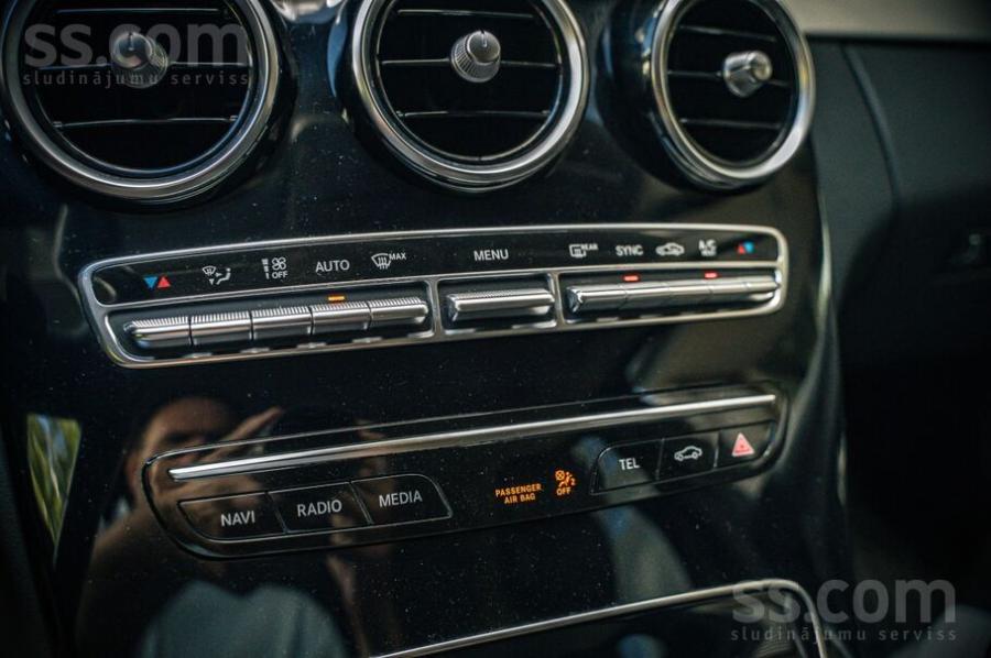 Black Mercedes-Benz C 200 2019 in Riga, with an engine capacity of 1.60 L and mileage of 185 thousand km for 14990 €, photo 24 on AUTOMOTO.COM.LV