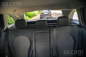 Black Mercedes-Benz C 200 2019 in Riga, with an engine capacity of 1.60 L and mileage of 185 thousand km for 14990 €, photo 26 on AUTOMOTO.COM.LV