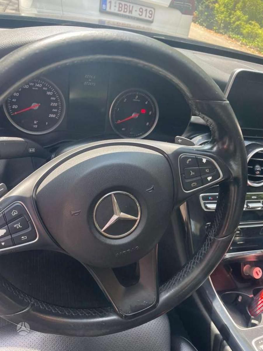 Blue Mercedes-Benz C 200 2016 in Utena, with an engine capacity of 2.00 L and mileage of 380 thousand km for 8650 €, photo 8 on AUTOMOTO.COM.LV
