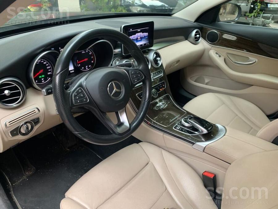 Brown Mercedes-Benz C 200 2014 in Riga, with an engine capacity of 2.00 L and mileage of 130 thousand km for 13900 €, photo 5 on AUTOMOTO.COM.LV