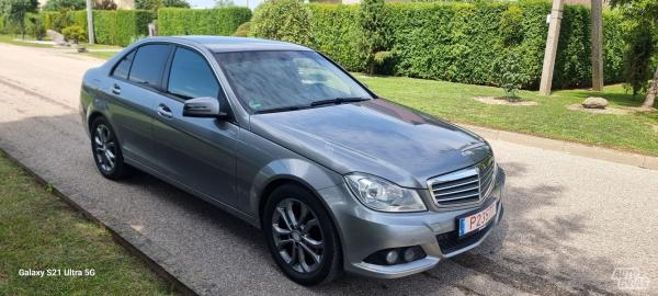 Grey Mercedes-Benz C 200 2013 in Kedainiai, with an engine capacity of 2.10 L and mileage of 231 thousand km for 6199 €, photo 2 on AUTOMOTO.COM.LV