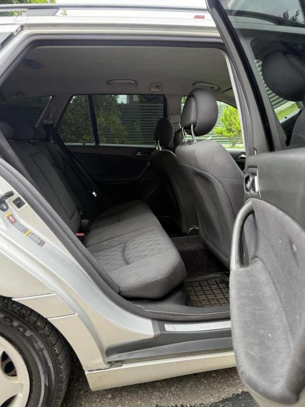 Grey Mercedes-Benz C 200 2003 in Vilnius, with an engine capacity of 2.15 L and mileage of 339 thousand km for 1650 €, photo 10 on AUTOMOTO.COM.LV
