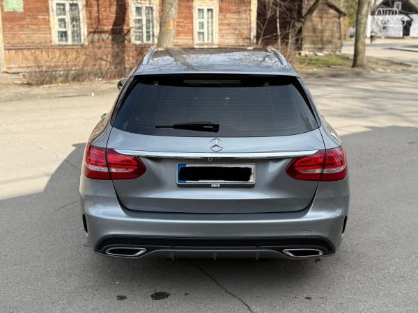 Grey Mercedes-Benz C 200 2015 in Siauliai, with an engine capacity of 1.60 L and mileage of 287 thousand km for 9800 €, photo 9 on AUTOMOTO.COM.LV