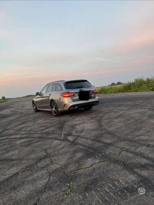 Grey Mercedes-Benz C 200 2016 in Kaunas, with an engine capacity of 2.00 L and mileage of 290 thousand km for 11500 €, photo 11 on AUTOMOTO.COM.LV