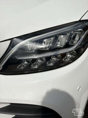 White Mercedes-Benz C 200 2021 in Kaunas, with an engine capacity of 1.50 L and mileage of 184 thousand km for 25990 €, photo 13 on AUTOMOTO.COM.LV