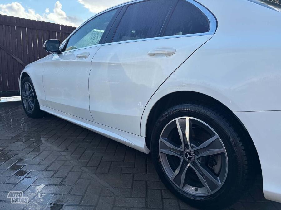 White Mercedes-Benz C 200 2021 in Kaunas, with an engine capacity of 1.50 L and mileage of 184 thousand km for 25990 €, photo 14 on AUTOMOTO.COM.LV