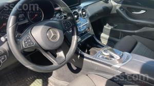 White Mercedes-Benz C 200 2015 in Riga, with an engine capacity of 1.60 L and mileage of 269 thousand km for 11500 €, photo 15 on AUTOMOTO.COM.LV